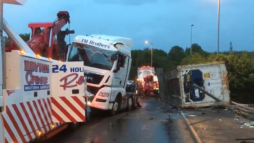 Ipswich A14: Lorry hanging over dual carriageway pulled to safety - BBC News