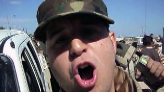 New footage of Gaddafi's capture - BBC News