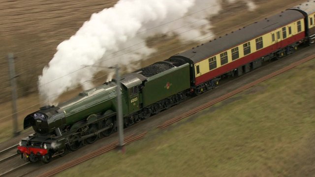 Flying Scotsman returns to the tracks after £4m restoration - BBC News