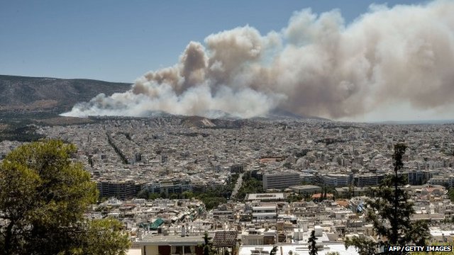 Greece forest fires threaten homes in Athens and in south - BBC News