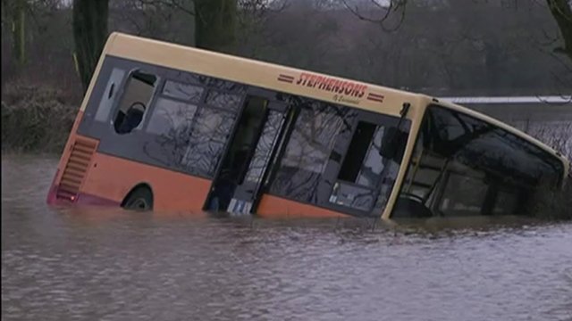 Easingwold School pupils rescued from flooded bus near York - BBC News