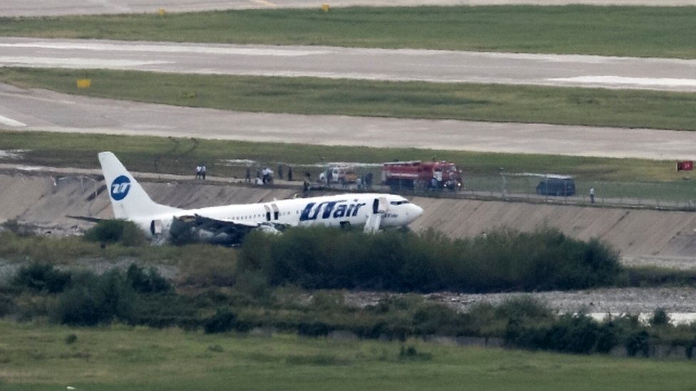 Russian air crash: Utair jet catches fire after landing at Sochi - BBC News
