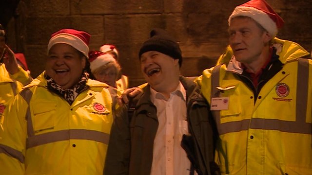 Homeless people in Newcastle enjoy a Christmas street party - BBC News