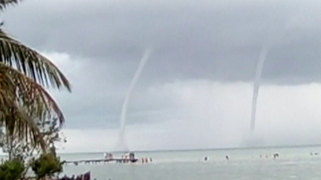 Rare waterspout filmed on lake in China - BBC News