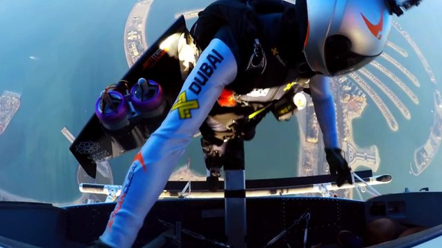 Man flies out of lake on jetpack - BBC Newsround