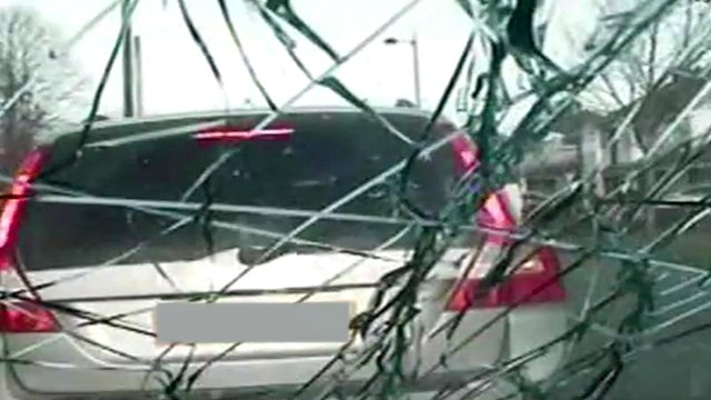 Driver threw brick at police car windscreen in Kirkby - BBC News