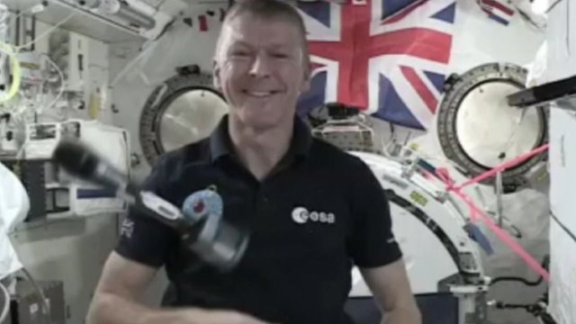 ISS cosmonaut does 'test flight' on a vacuum cleaner - BBC News