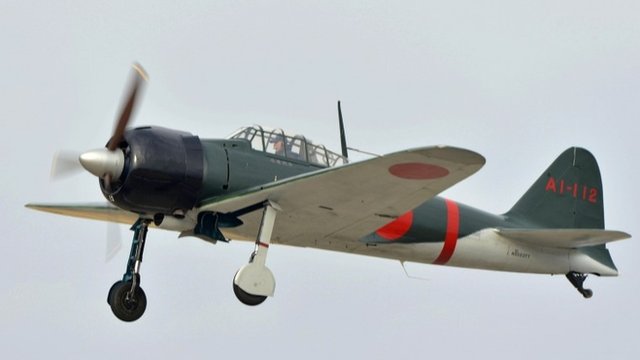 Japan WWII fighter plane takes to the skies - BBC News