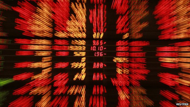 32 charged over 'insider trading hack' scheme - BBC News