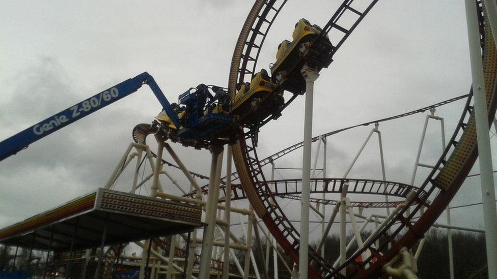 Eight rescued from rollercoaster at M&D's theme park - BBC News