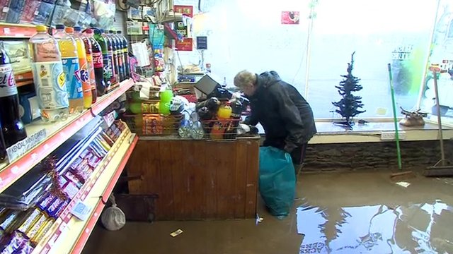 Storm Desmond: Inside the twice-flooded Cumbrian shop - BBC News