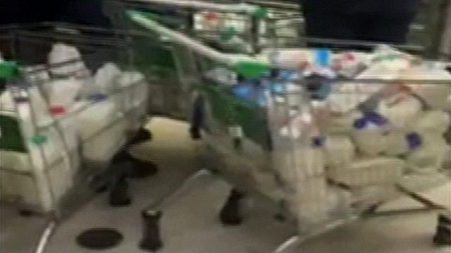 Farmers stage cow protest in Asda over milk prices - BBC News