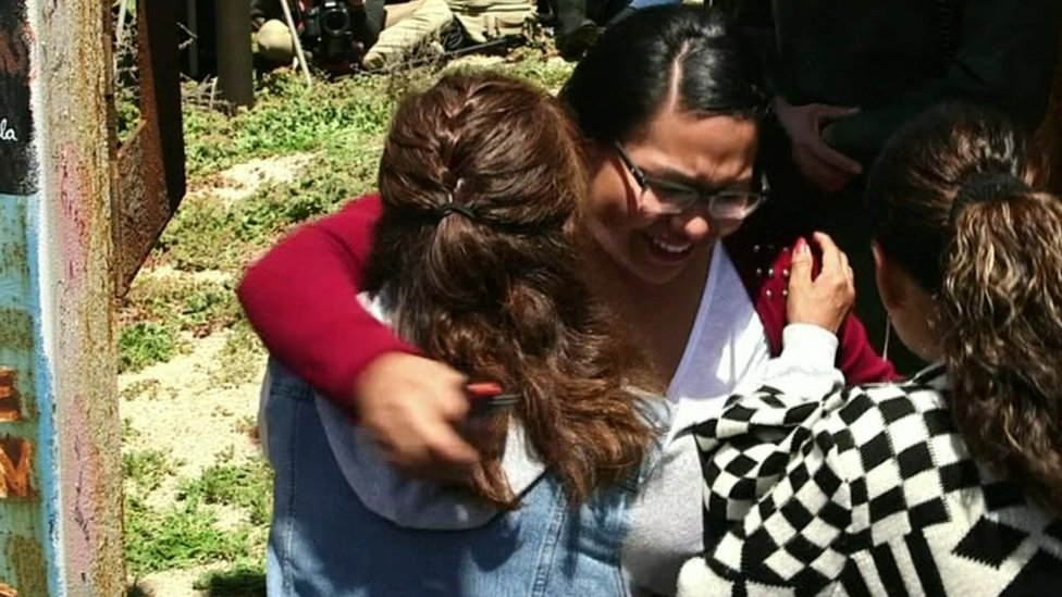 Families reunited after US-Mexico border opens briefly - BBC News