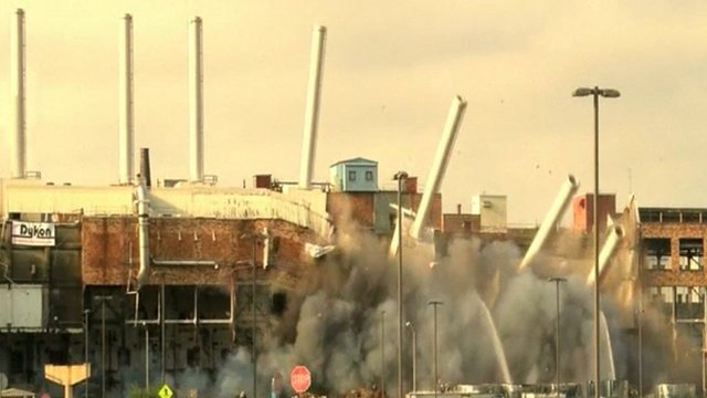 Controlled blast brings down former Kodak factory - BBC News