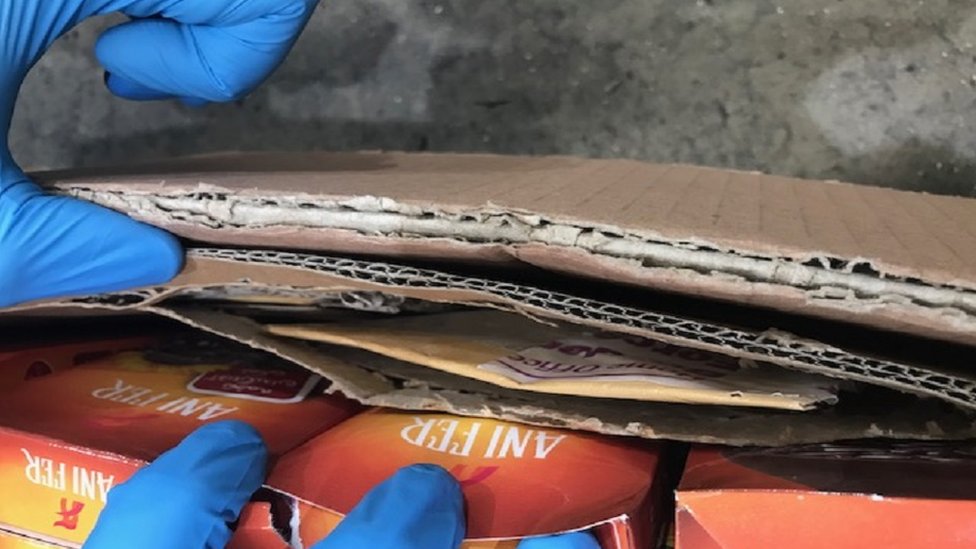 Heroin found inside boxes of fruit and nuts at Heathrow Airport - BBC News