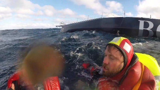 Sailor Tony Bullimore rescued from his capsized boat - BBC News