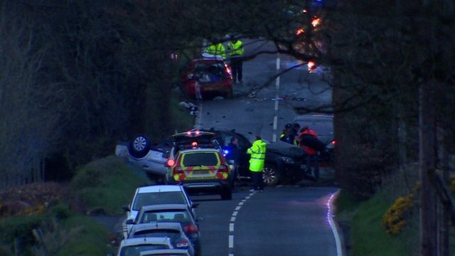 Man dies and two are critical after County Antrim crash - BBC News
