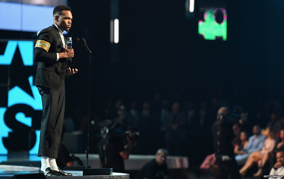 Chance the Rapper wins BET humanitarian award, presented by Michelle ...