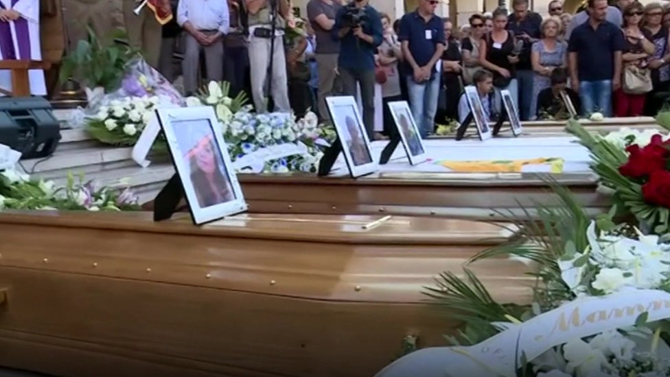 Funerals held in Italy as search for survivors continues - BBC News