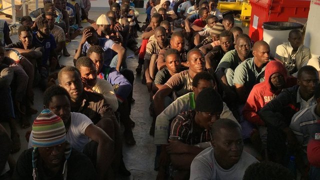 Devon beach lifeguard's double life rescuing refugees - BBC News