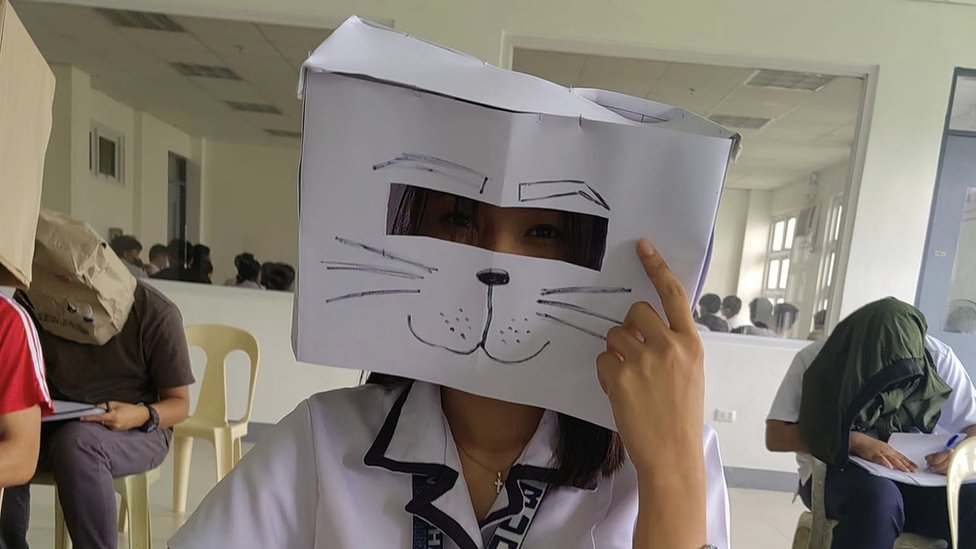 Students wear homemade 'anti-cheating' hats during exam - CBBC Newsround