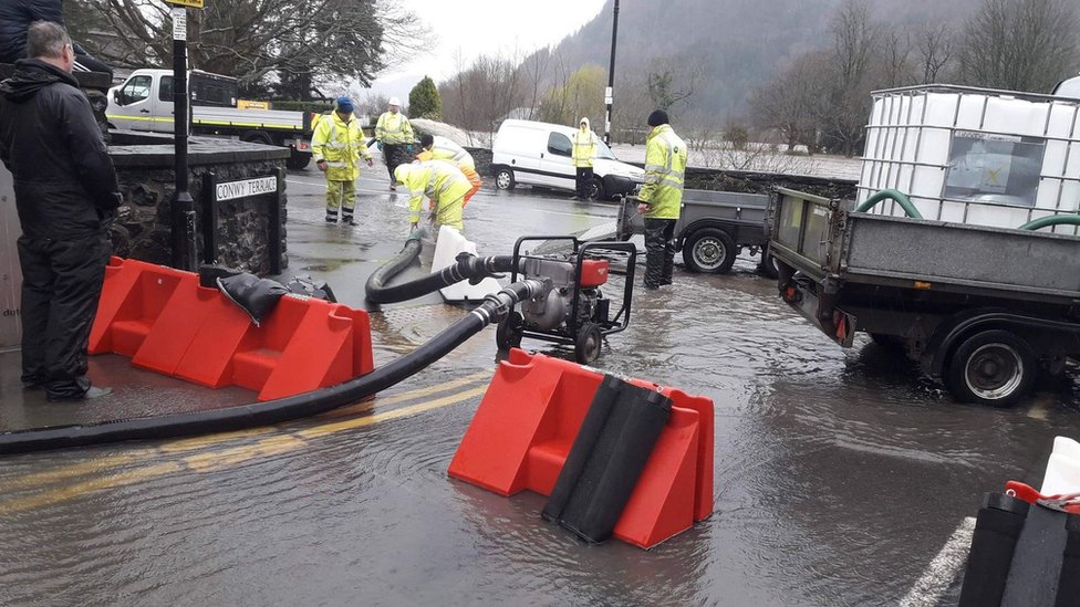 Wales suffers floods and power cuts as wind and rain hits - BBC News