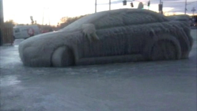 US car becomes icicle as snow hits New York - BBC News