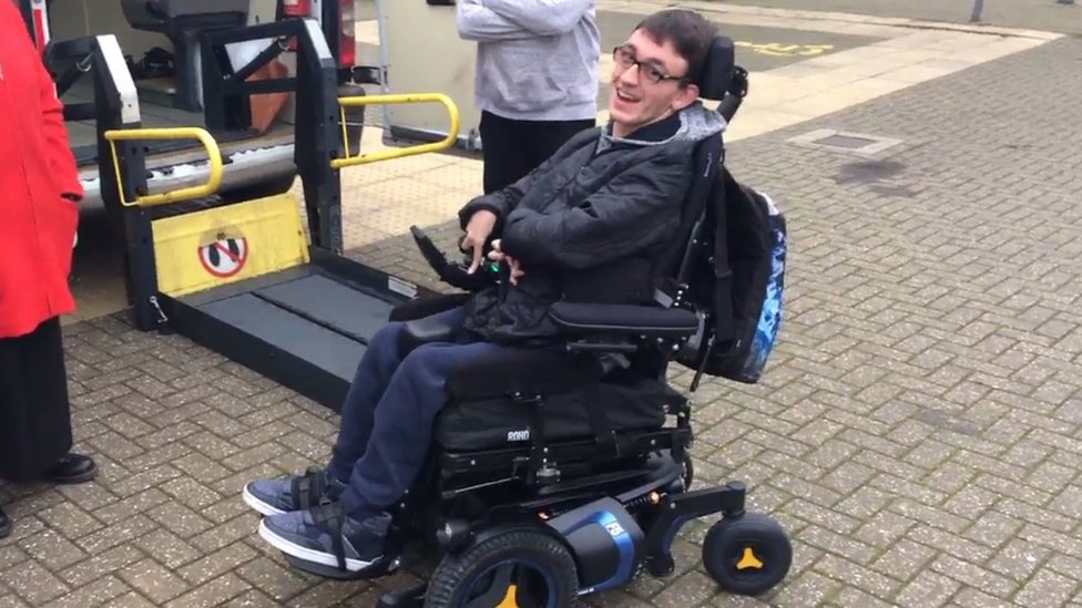 Thomas Grice gets new wheelchair after charity loo lock-in - BBC News