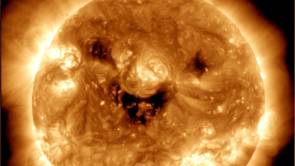 Nasa captures pic of the Sun 'smiling' with a happy face - CBBC Newsround