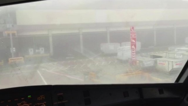 Video inside cockpit shows what it is like landing in fog - BBC News