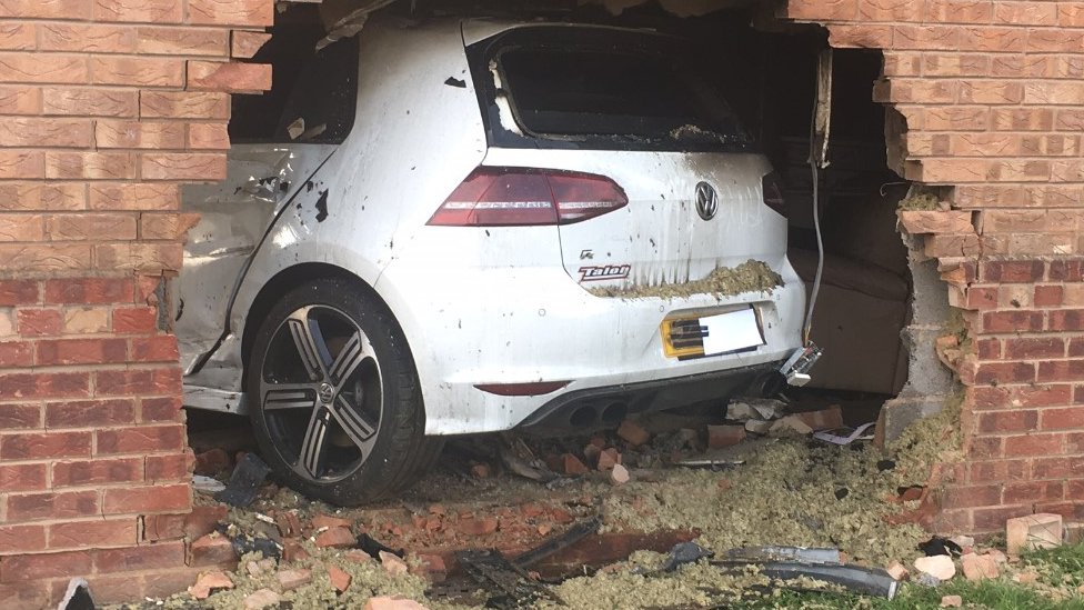 Four injured as car smashes into house in York - BBC News