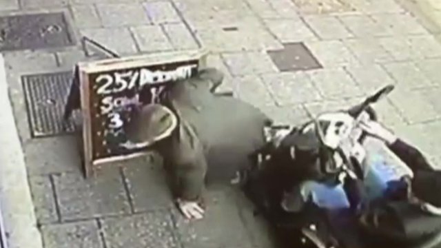 CCTV shows mobility scooter hitting man - BBC News