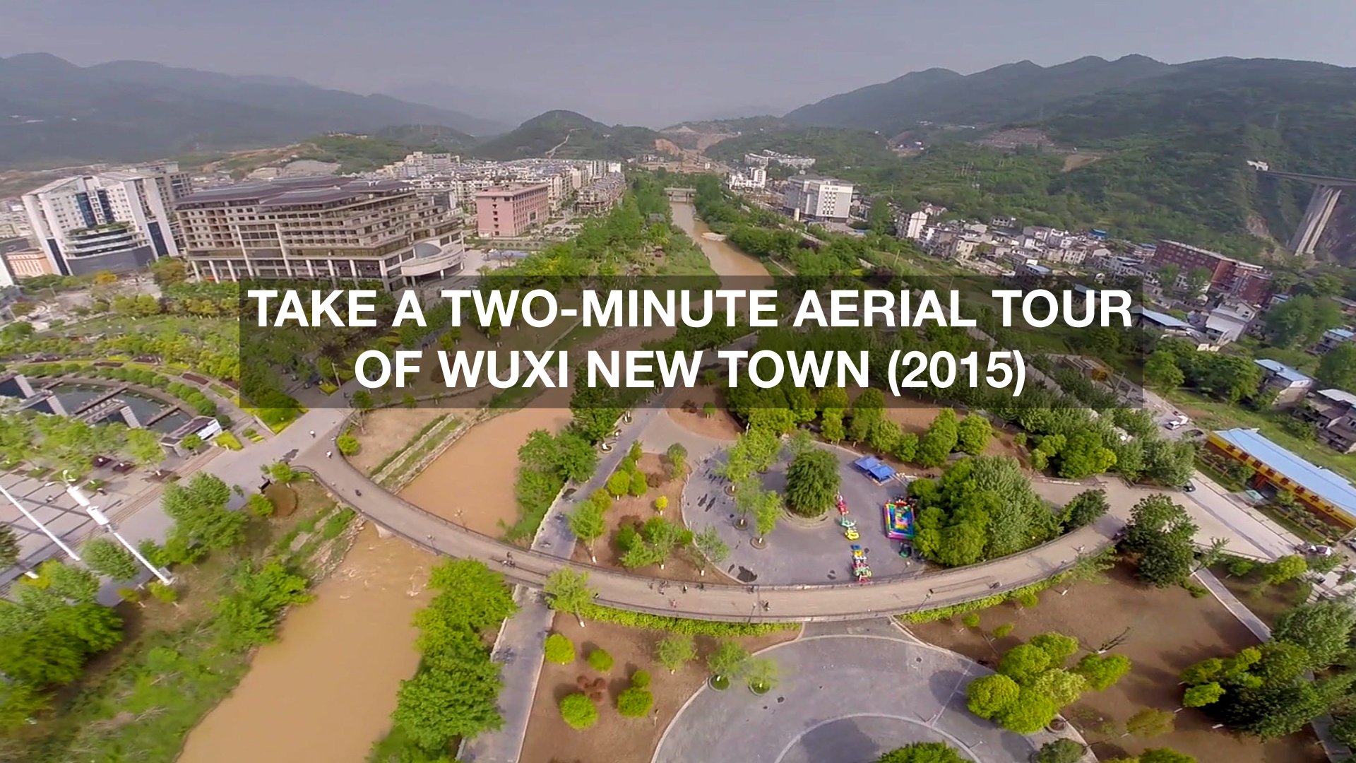 Aerial tour of Wuxi New Town - BBC News
