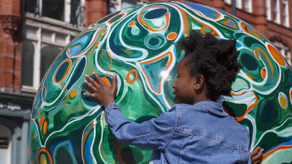 Globe art installation explores racial inequality through British ...