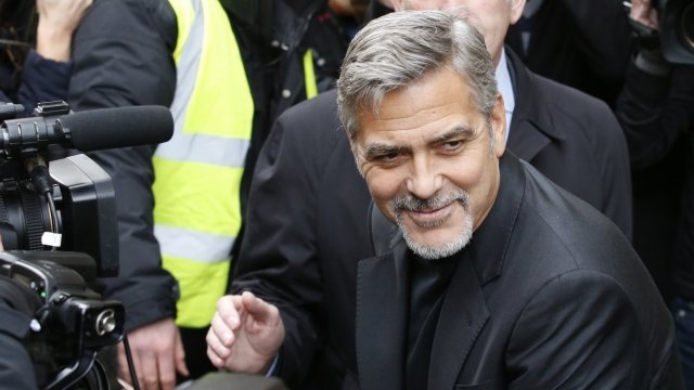 George Clooney visits charity cafe in Edinburgh - BBC News
