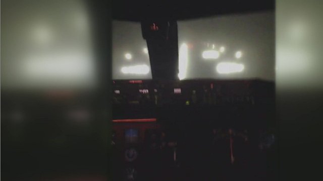 Video inside cockpit shows what it is like landing in fog - BBC News