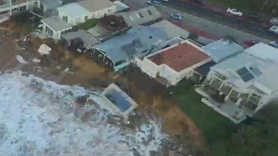 Australia storm aftermath reveals pool swept away - BBC News