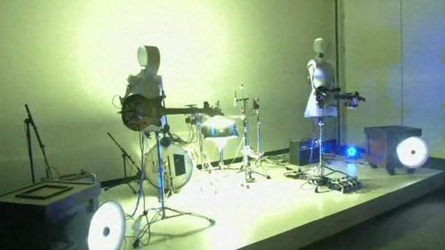 Japan's new robot band plays at music festival - BBC Newsround