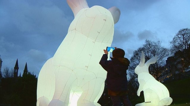 Giant glowing rabbits light Aberdeen city centre - BBC News