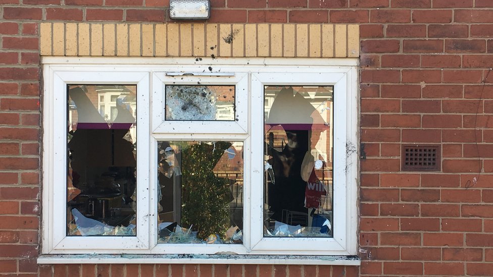 Teenager held after forensics van torched - BBC News