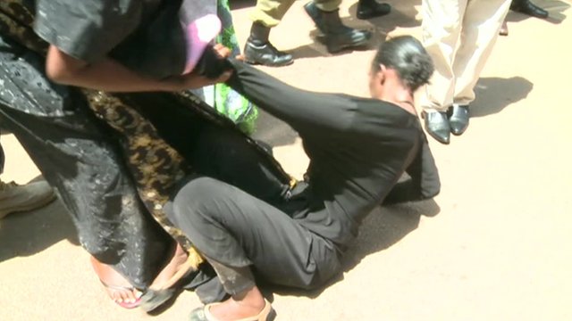 Ugandan police confront female protesters - BBC News