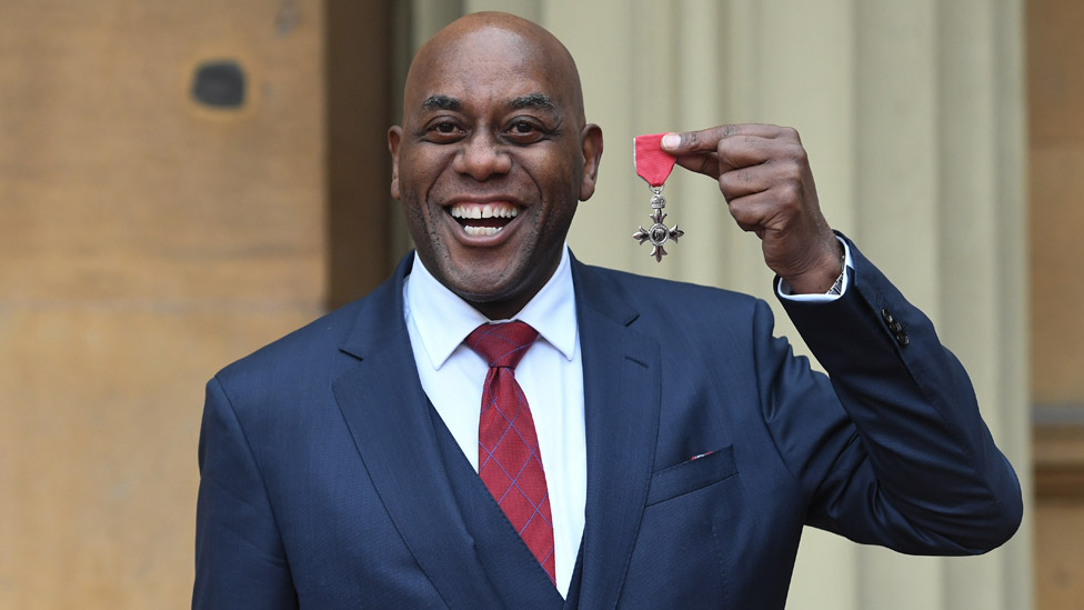 Ainsley Harriott receives 'very special' MBE from Prince Charles - BBC News