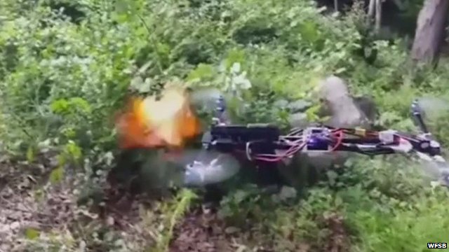Footage of handgun drone - BBC News
