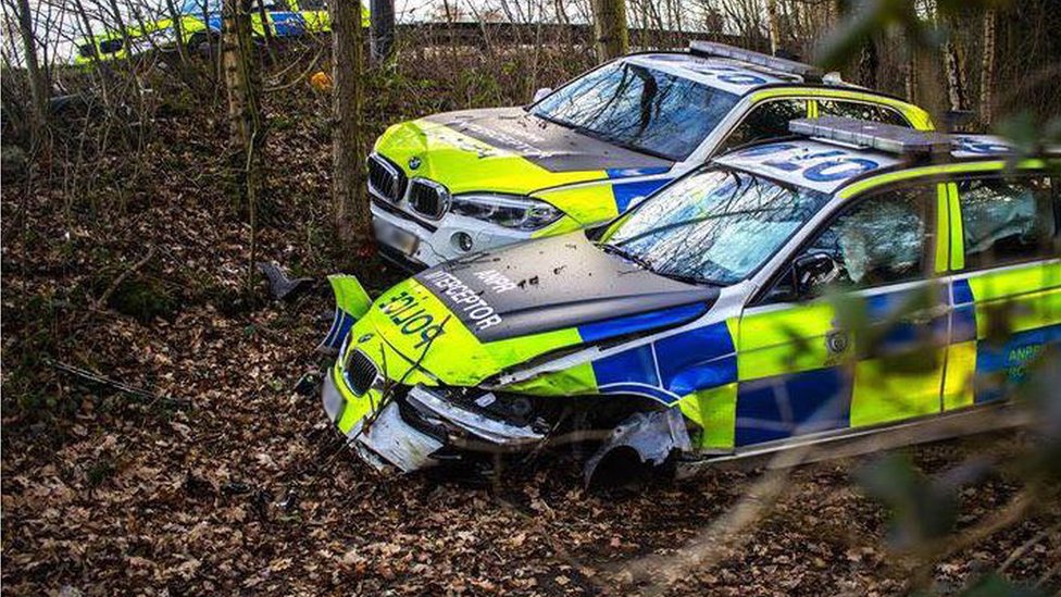 Cheshire Police cars crash during Wythenshawe off-road chase - BBC News