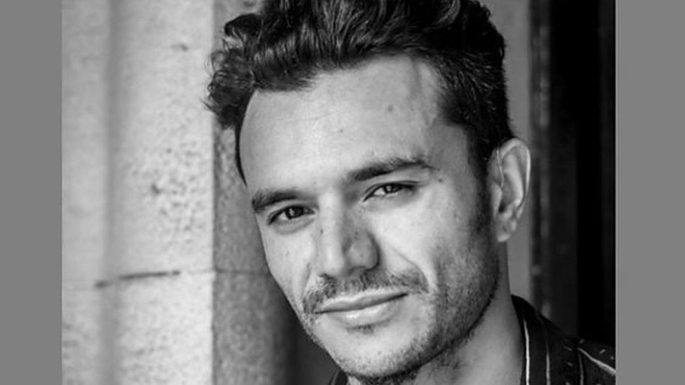 Deaf poet Raymond Antrobus wins Ted Hughes award - BBC News