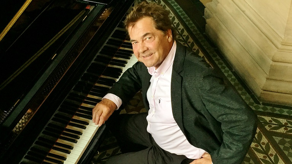 EastEnders theme tune composer Simon May buys back work - BBC News