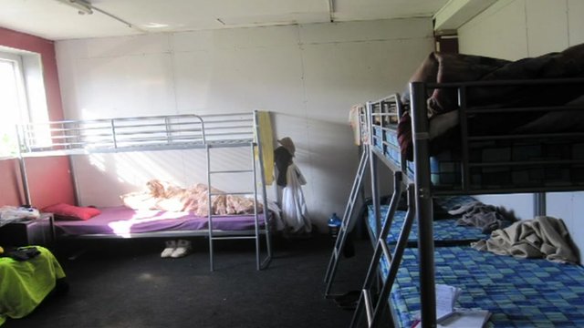 Inside Sealand building housing 107 migrants - BBC News