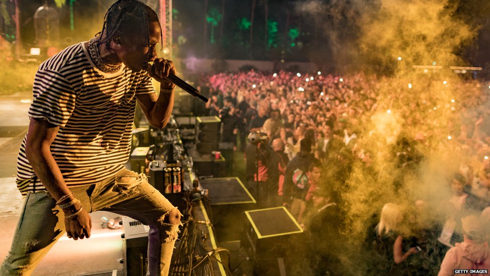 Travis Scott 'being sued' by fan after balcony fall - BBC News