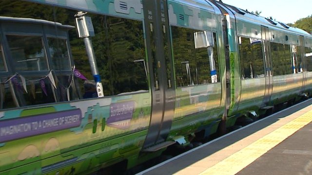 First commuters on reopened Borders railway - BBC News