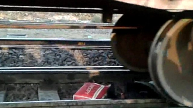 Indian woman survives after being run over by a train - BBC News